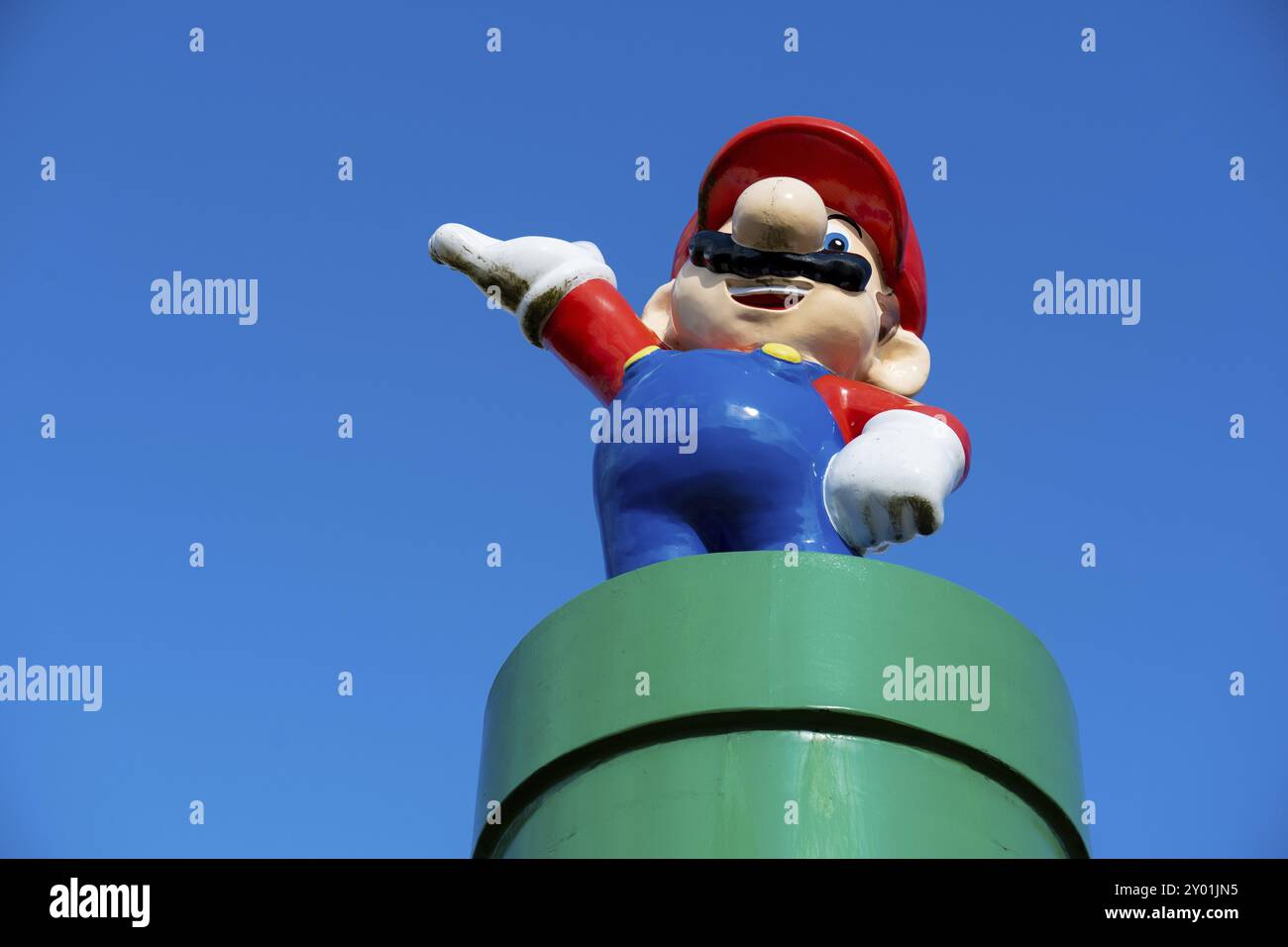 Kungsbacka, Sweden, september 11 2022: Mario statue on top of a green ...