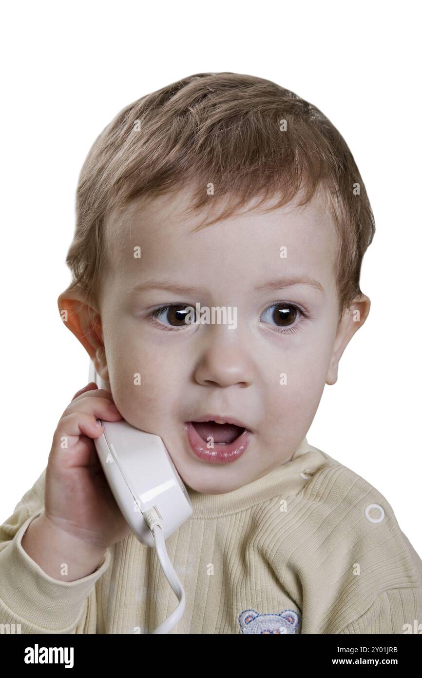 Communication, little child talking telephone Stock Photo - Alamy
