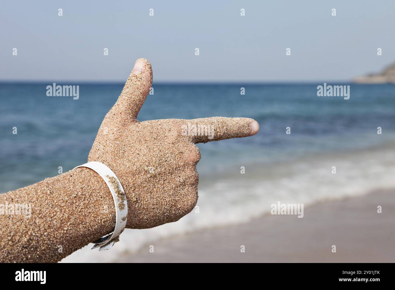 Summer vacations, woman hand index finger pointing direction to sea ...
