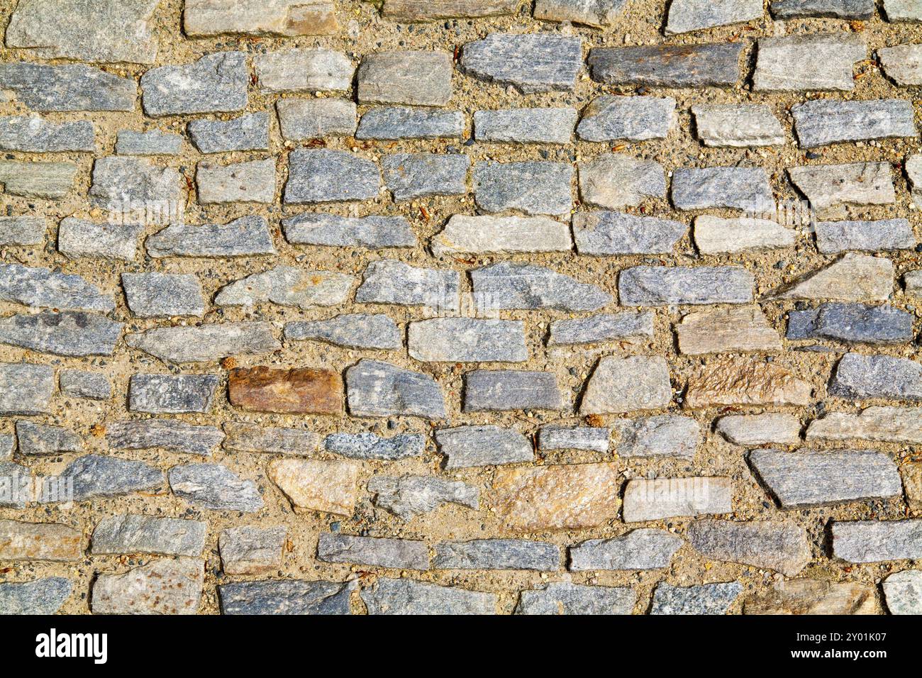 Stone pavement texture. Granite cobblestoned pavement background. Abstract background of old ...
