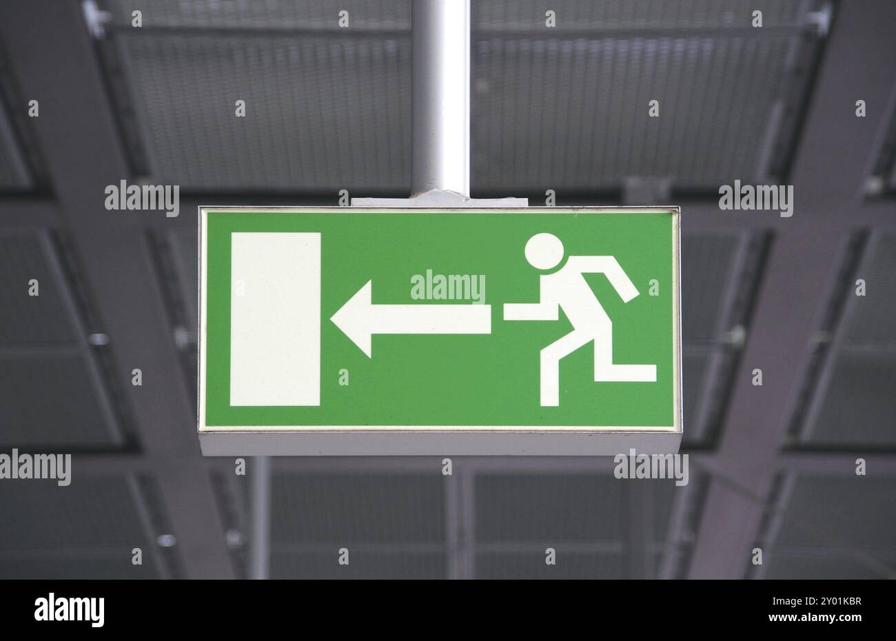 Green sign for emergency exit in a german railway station Stock Photo ...