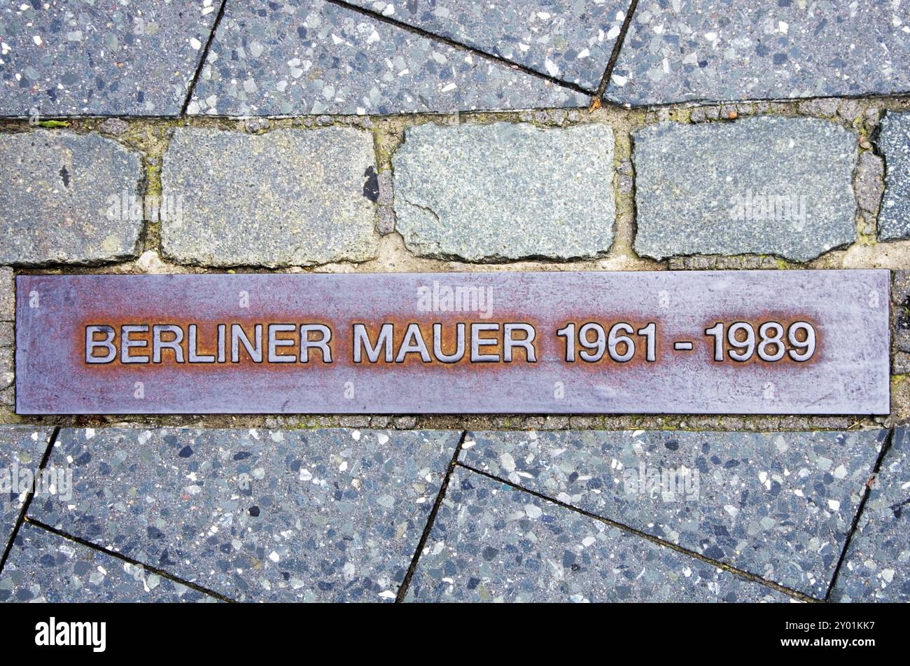 Memorial of the berlin wall in german text Stock Photo - Alamy