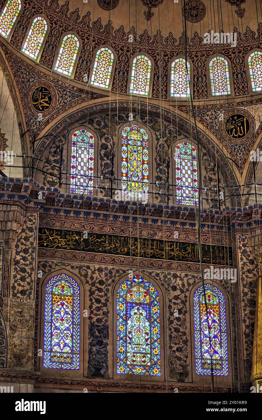 Ornate wall with stained glass windows in the Blue Mosque (Sultan Ahmed ...
