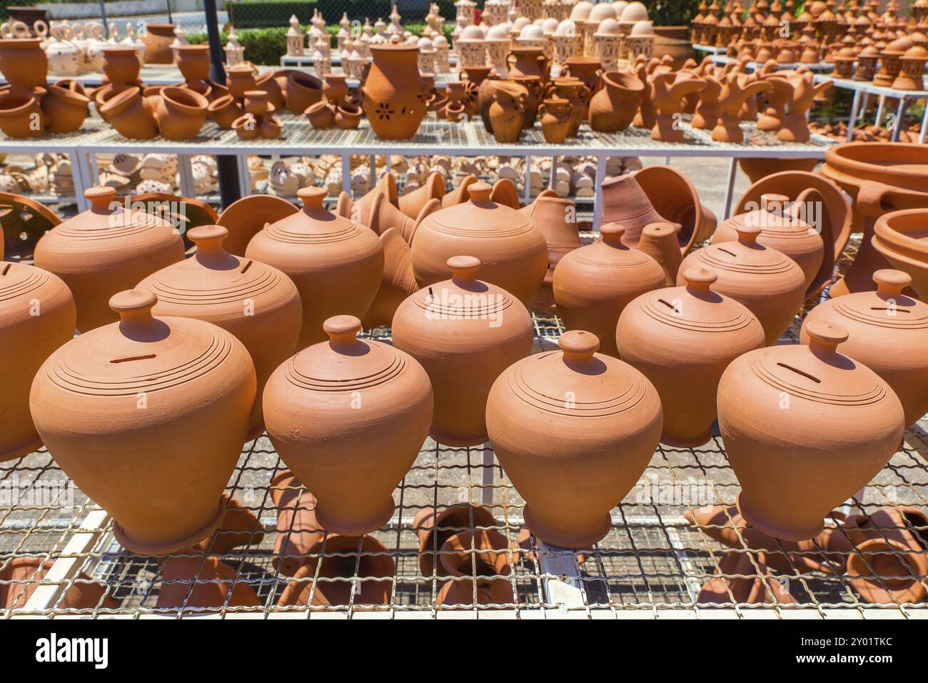 Many orange clay pots outdoors at pottery Stock Photo - Alamy