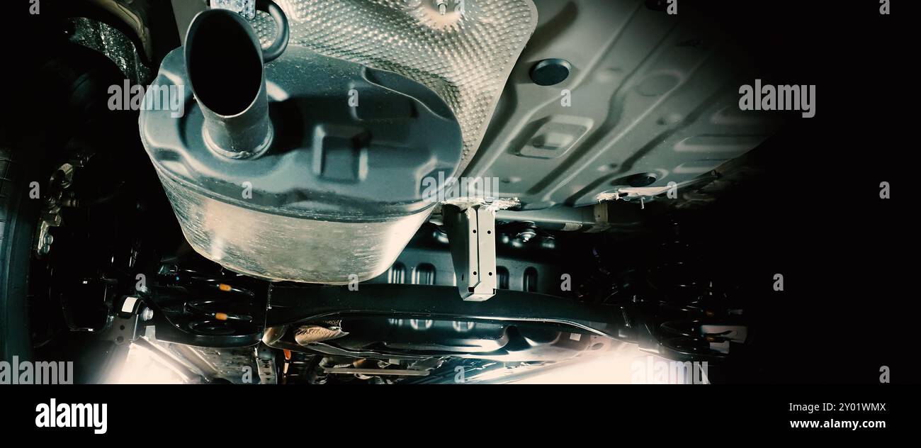 Under car exhaust pipe and suspension. Automotive mufflers. Inspection ...