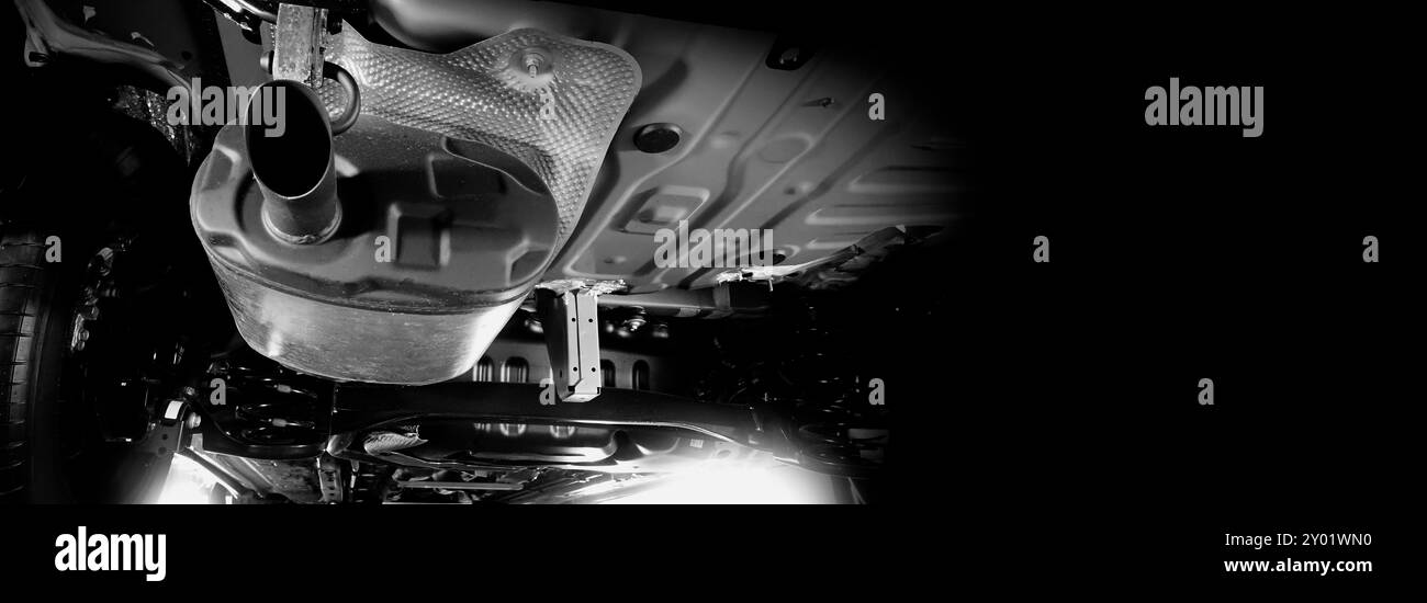 Under car exhaust pipe and suspension. Automotive mufflers. Inspection ...