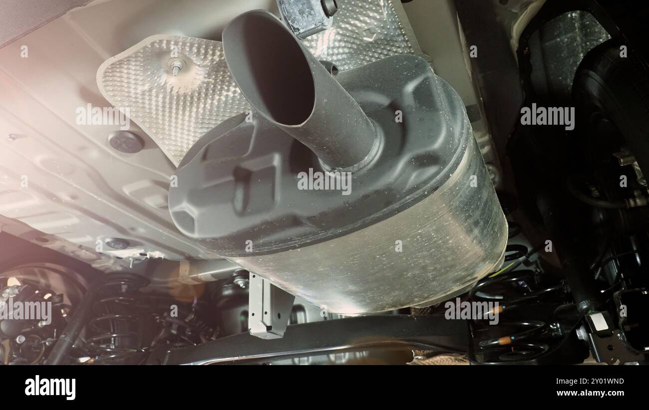 Under car exhaust pipe and suspension. Automotive mufflers. Inspection ...