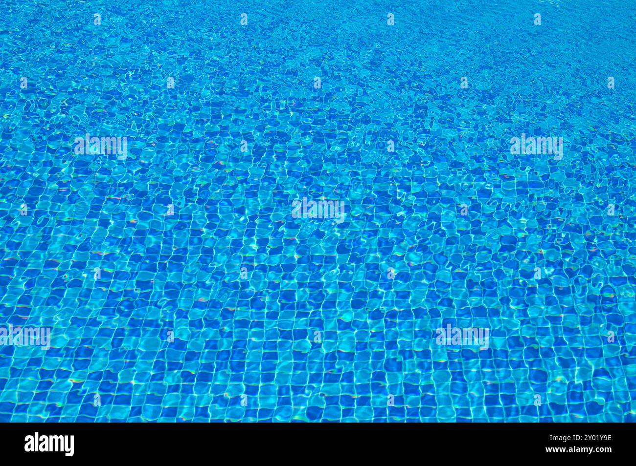 Abstract view of bottom caustics of swimming pool with ripple and flow ...