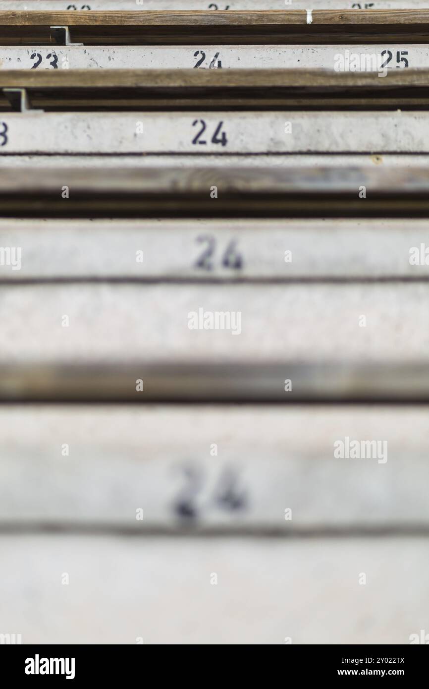 Painted numbers in an open-air theatre Stock Photo - Alamy