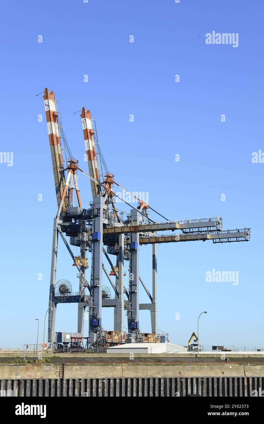Two gantry cranes ready to work Stock Photo - Alamy