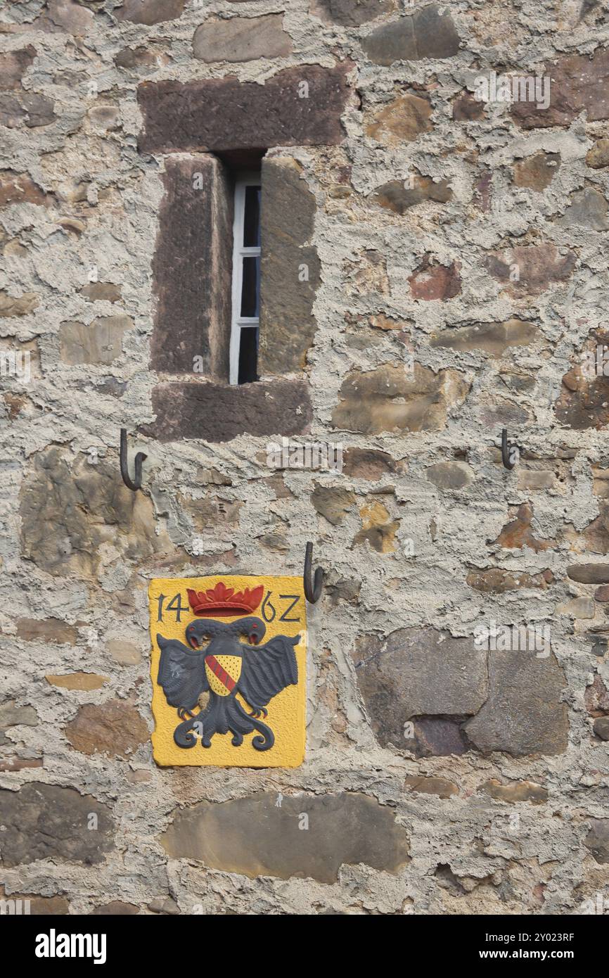 Town coat of arms with the year 1462 and hatch on the stork tower ...