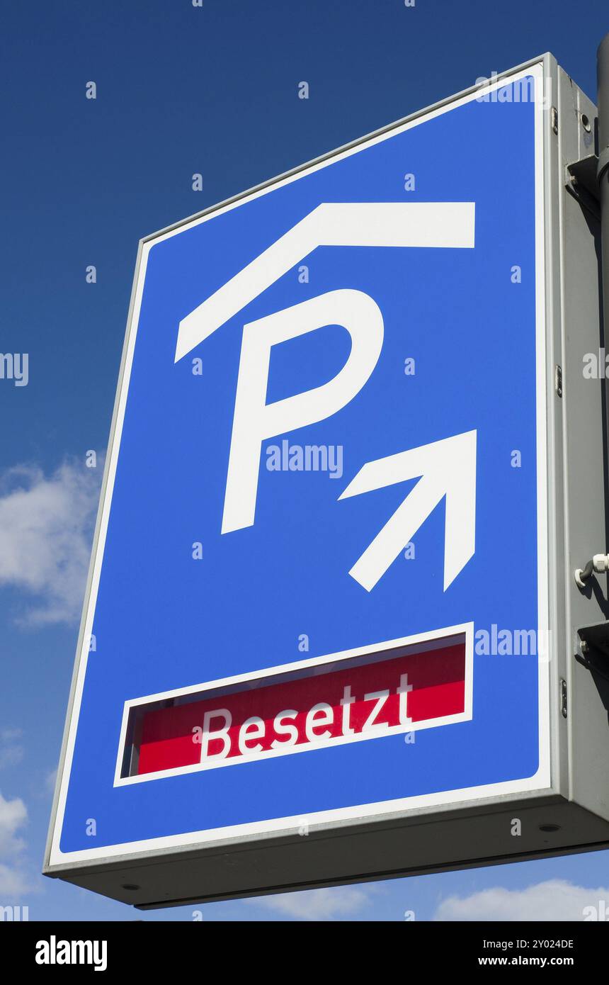 Signboard for parking garage shows occupied. Signboard for parking ...