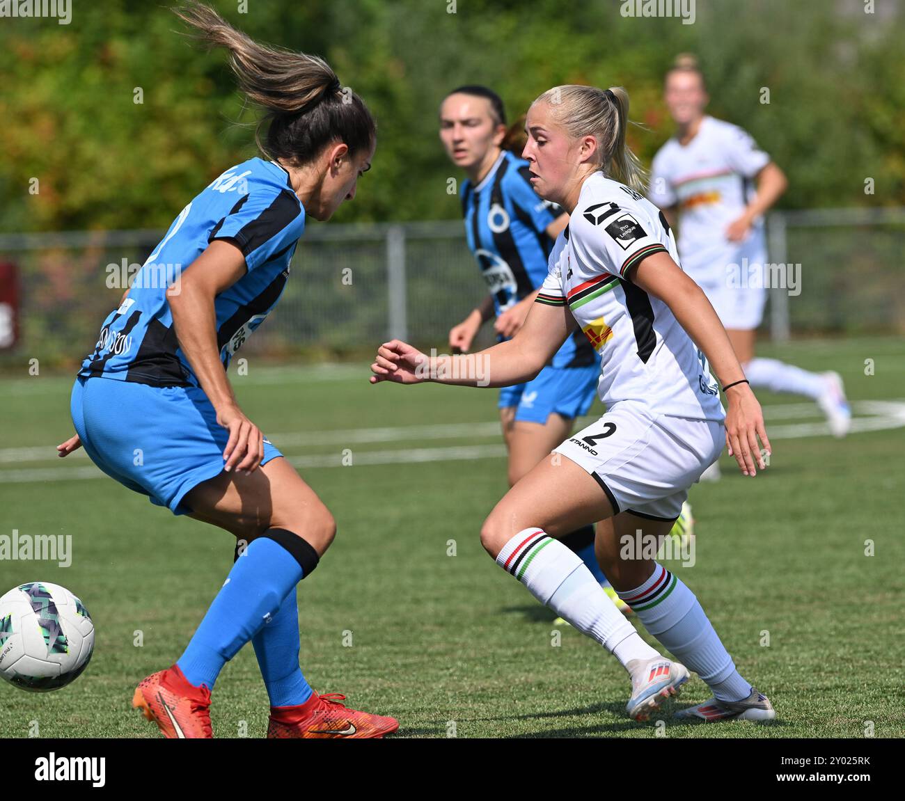 Aalter, Belgium. 31st Aug, 2024. Saar Janssen (2) of OHL and Sejde ...