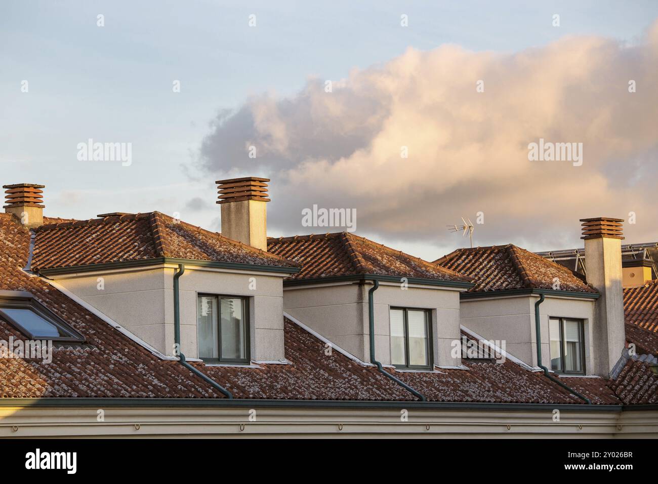View of of generic Apartment Building With Dormer Windows and clay roof ...