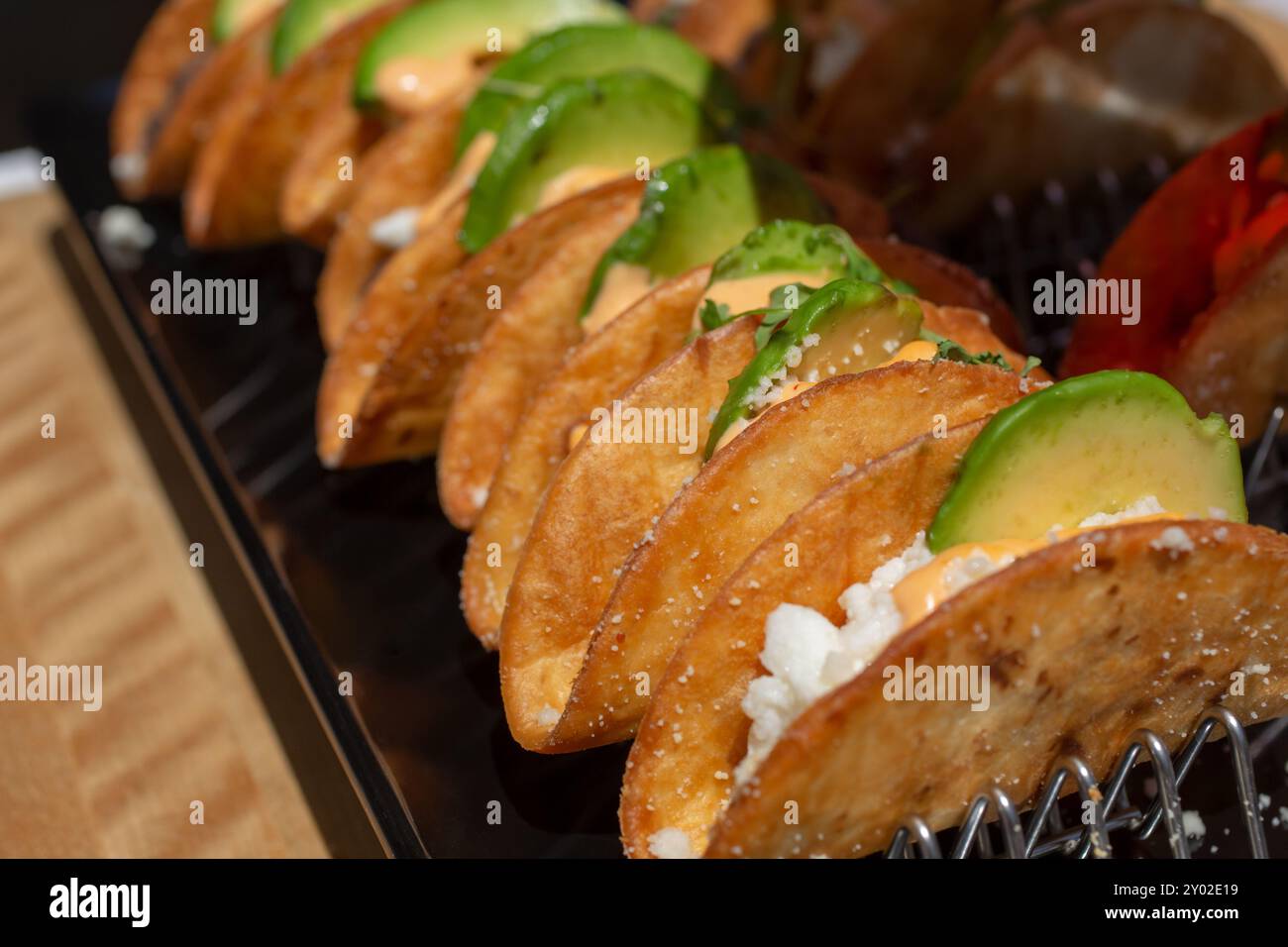 A view of a platter of crispy flour taco appetizers Stock Photo - Alamy