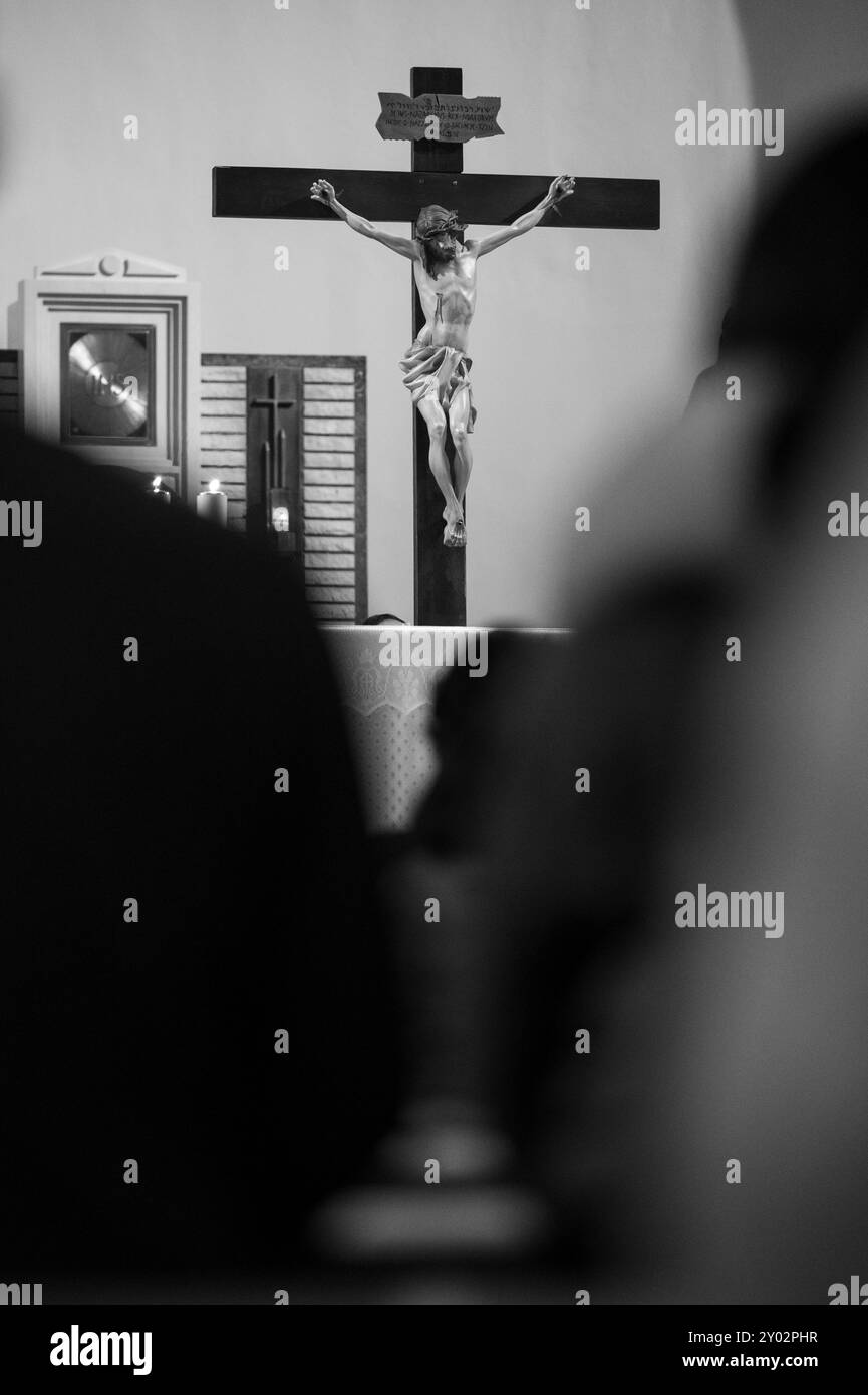 Veneration of the Holy Cross after Holy Mass in St James Church in ...