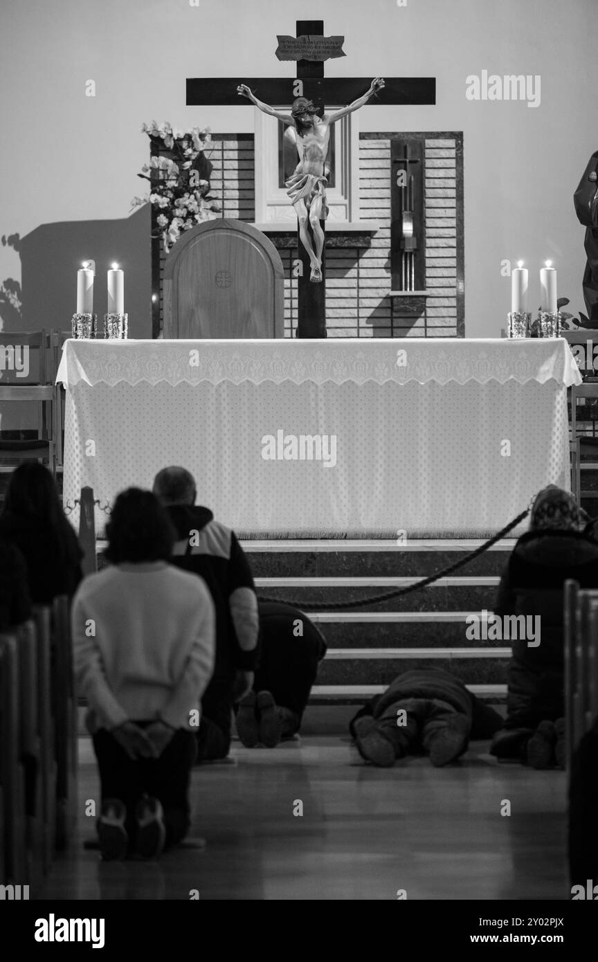 Veneration of the Holy Cross after Holy Mass in St James Church in ...