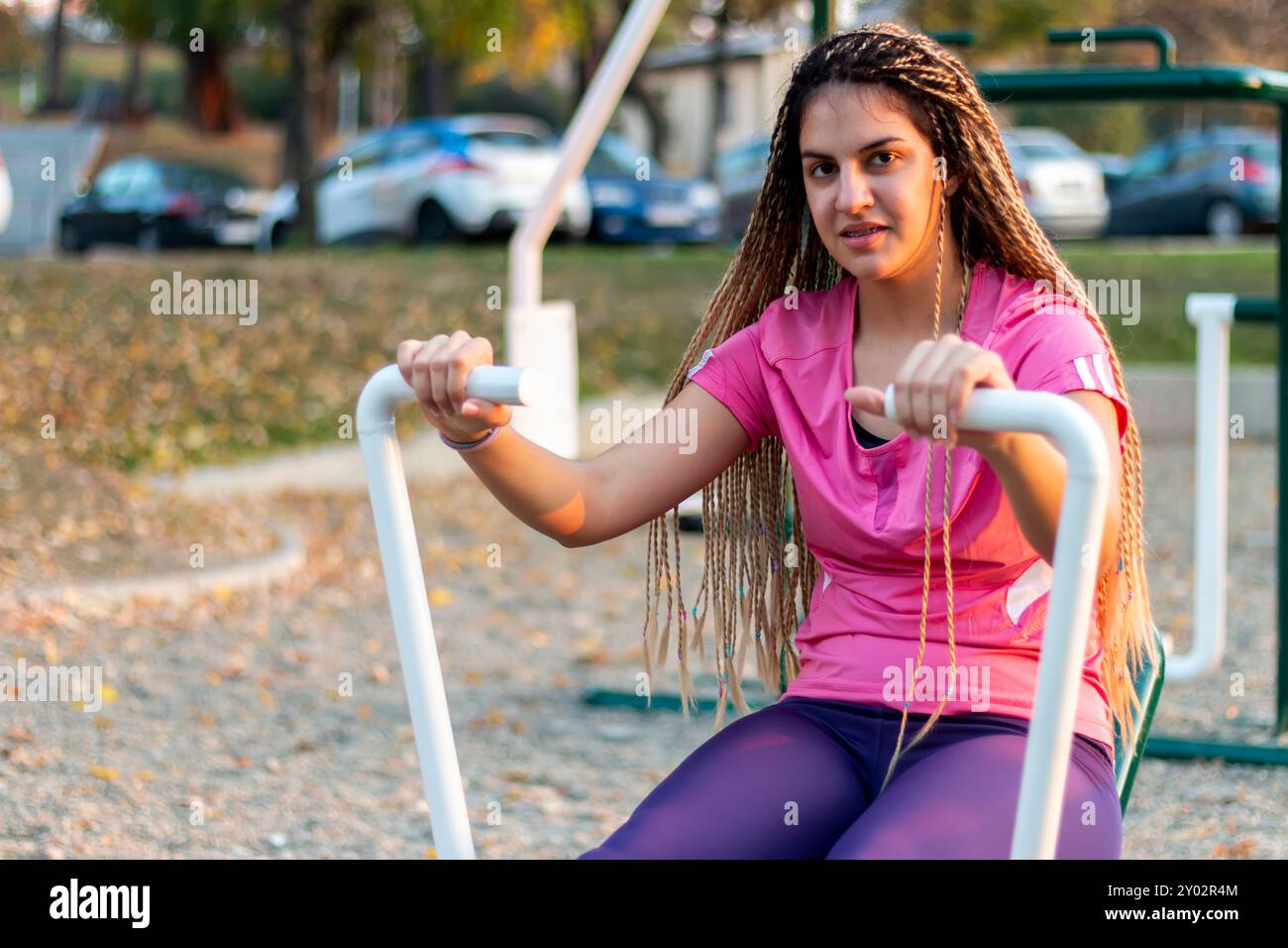 Beautiful teen girl working out in the gym and leading a healthy and ...