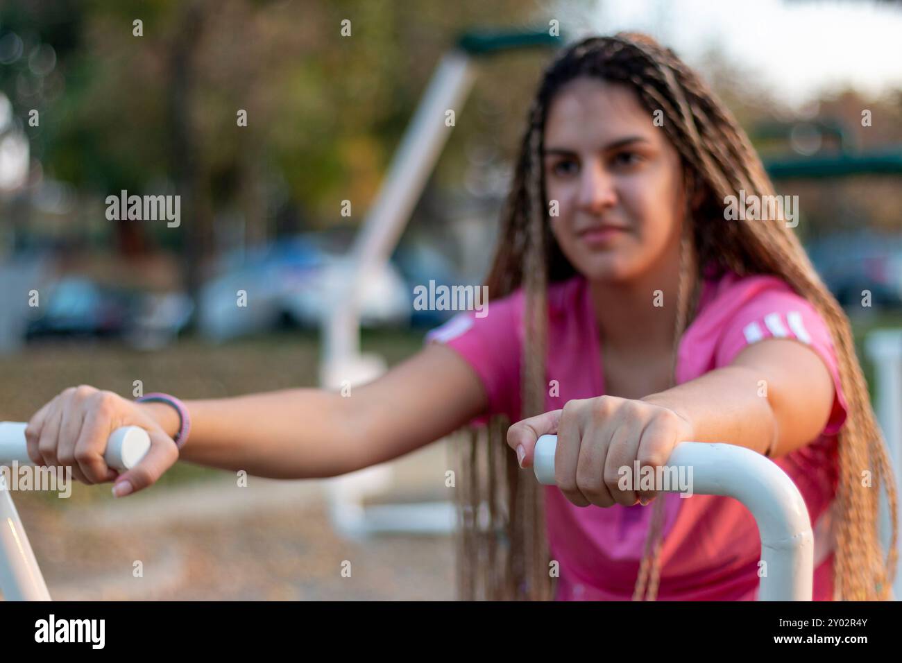Beautiful teen girl working out in the gym and leading a healthy and ...