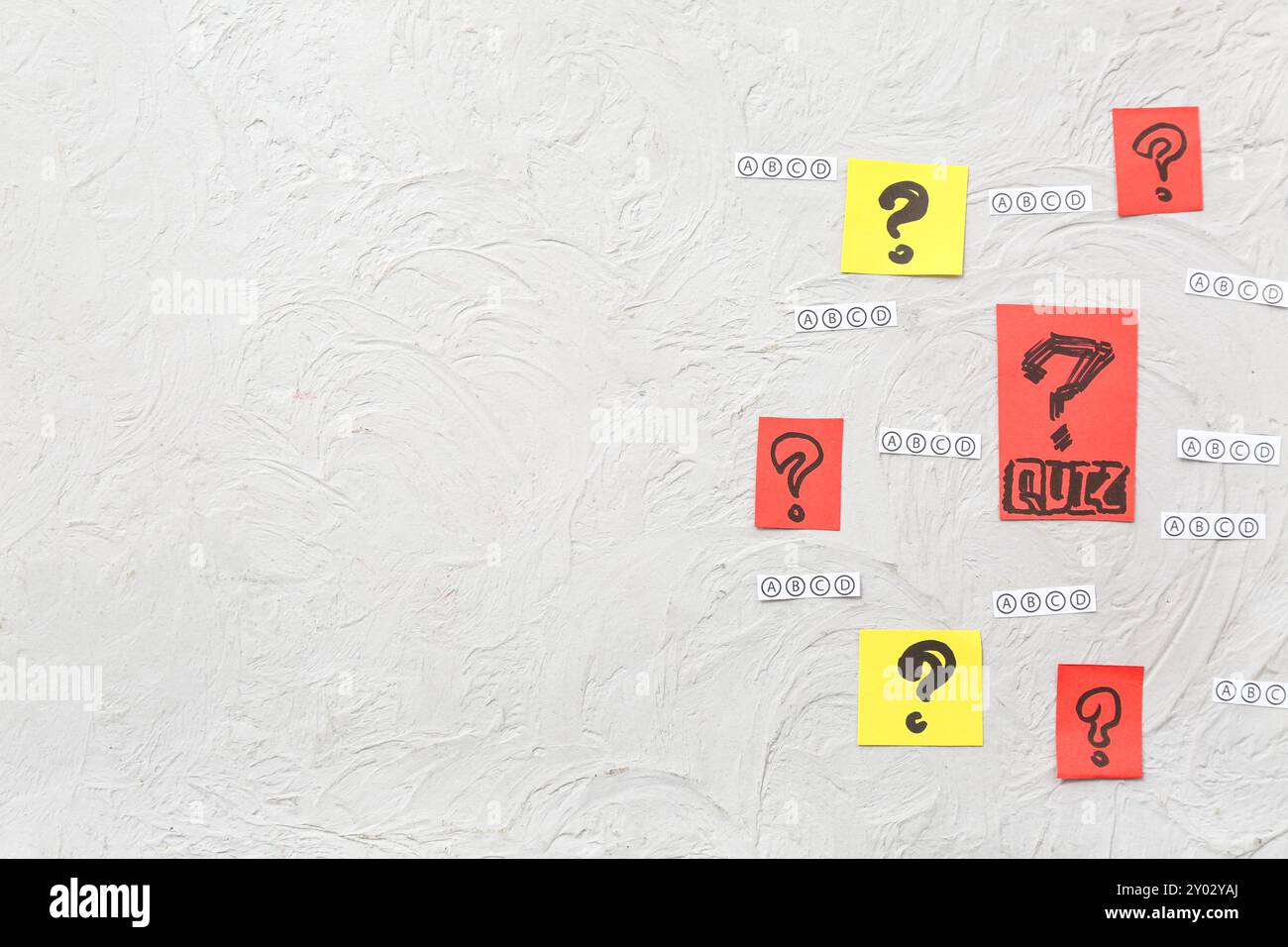 Quiz form and cards with question marks on grunge white background ...