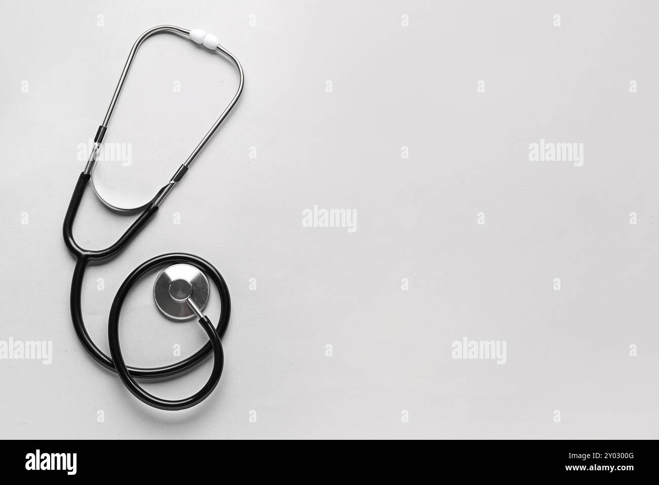 Modern stethoscope on light background Stock Photo - Alamy