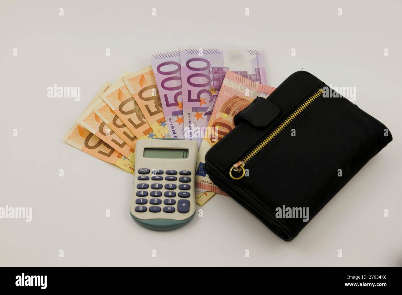 Open wallet with euro currency on the white background Stock Photo - Alamy