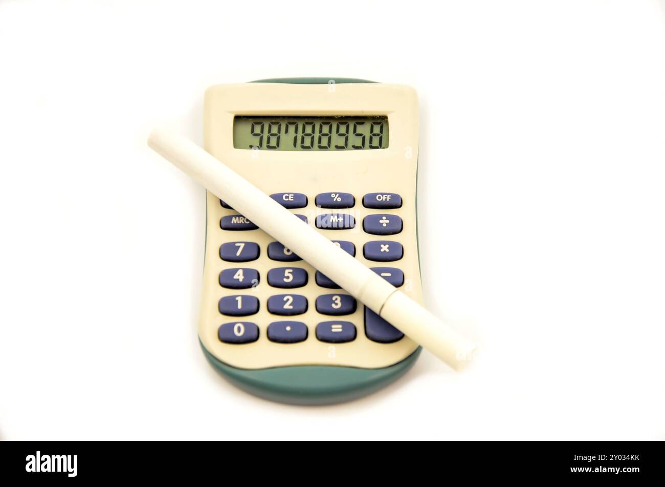 Close up view of calulator , and cigarettes Stock Photo - Alamy