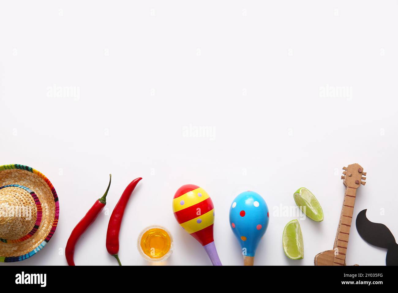 Composition with Mexican symbols, tequila and chili peppers on light ...