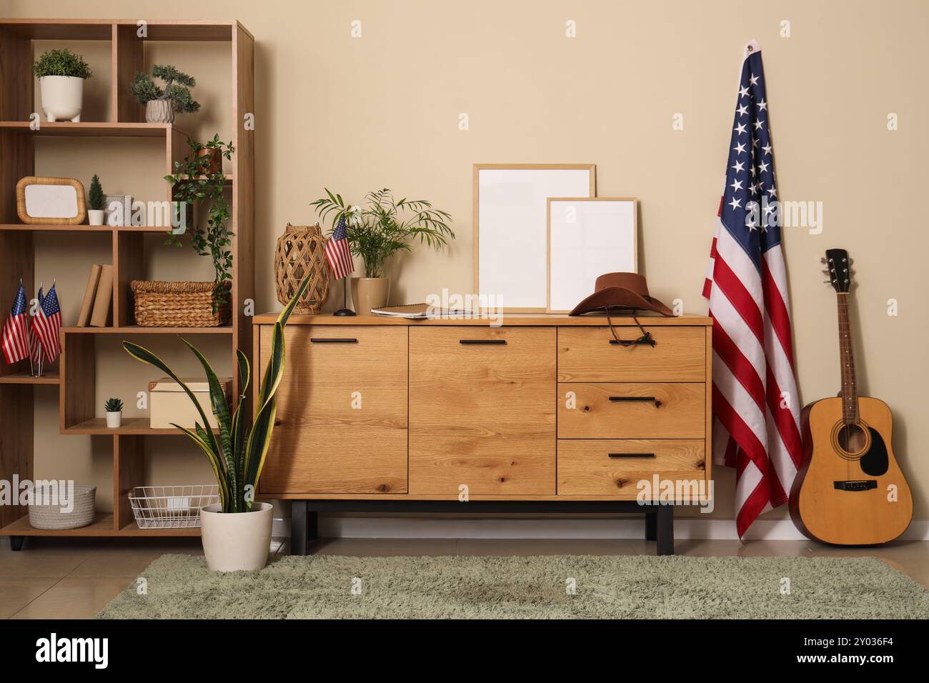 USA flags and chest of drawers in interior of stylish living room Stock ...