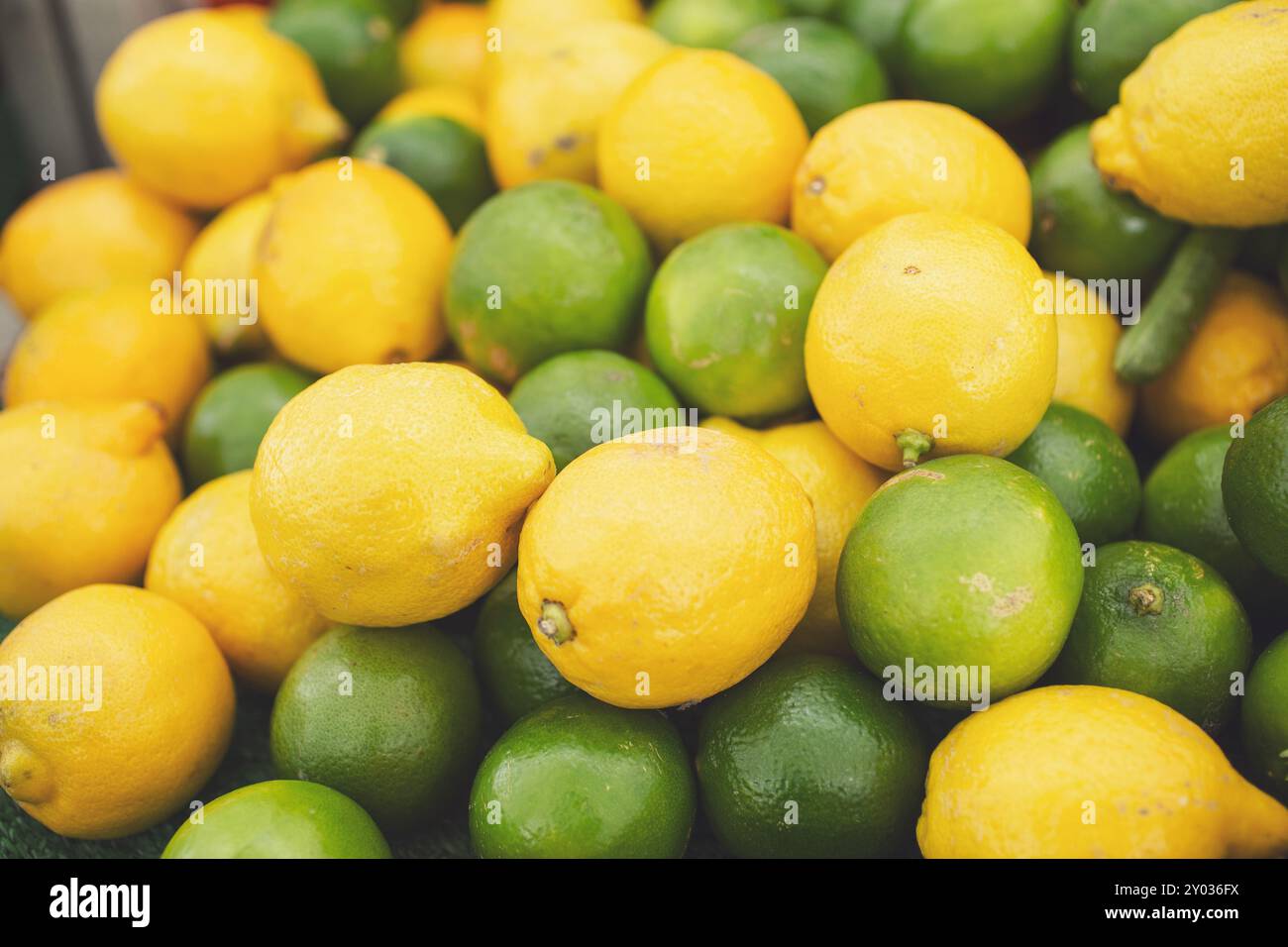 A view of a large pile of lemons and limes, on display at a local ...