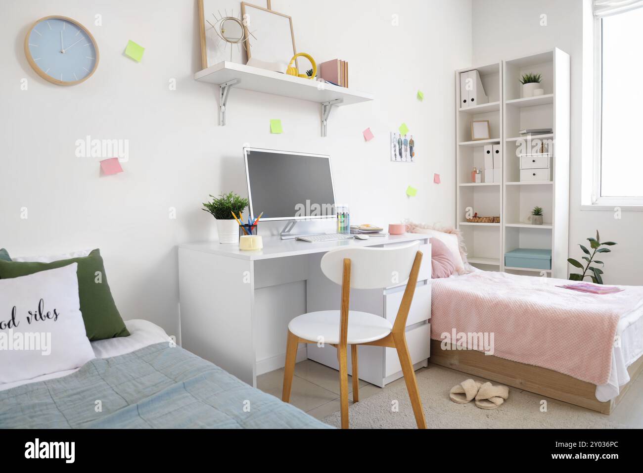 Interior of dorm room with beds, table and sticky notes Stock Photo - Alamy