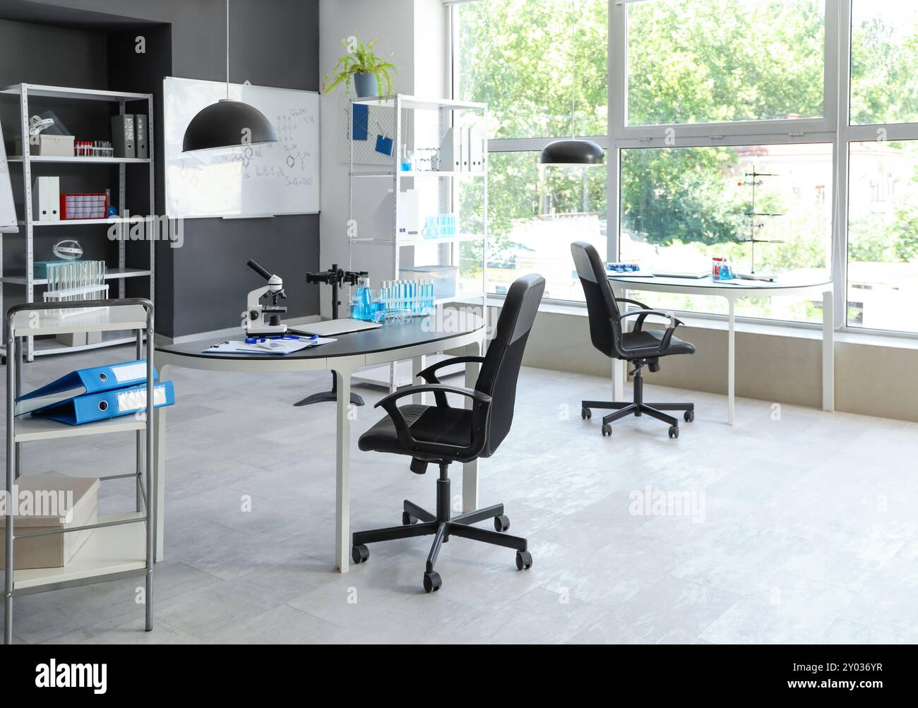 Interior of laboratory with desks, shelf units and whiteboard Stock ...