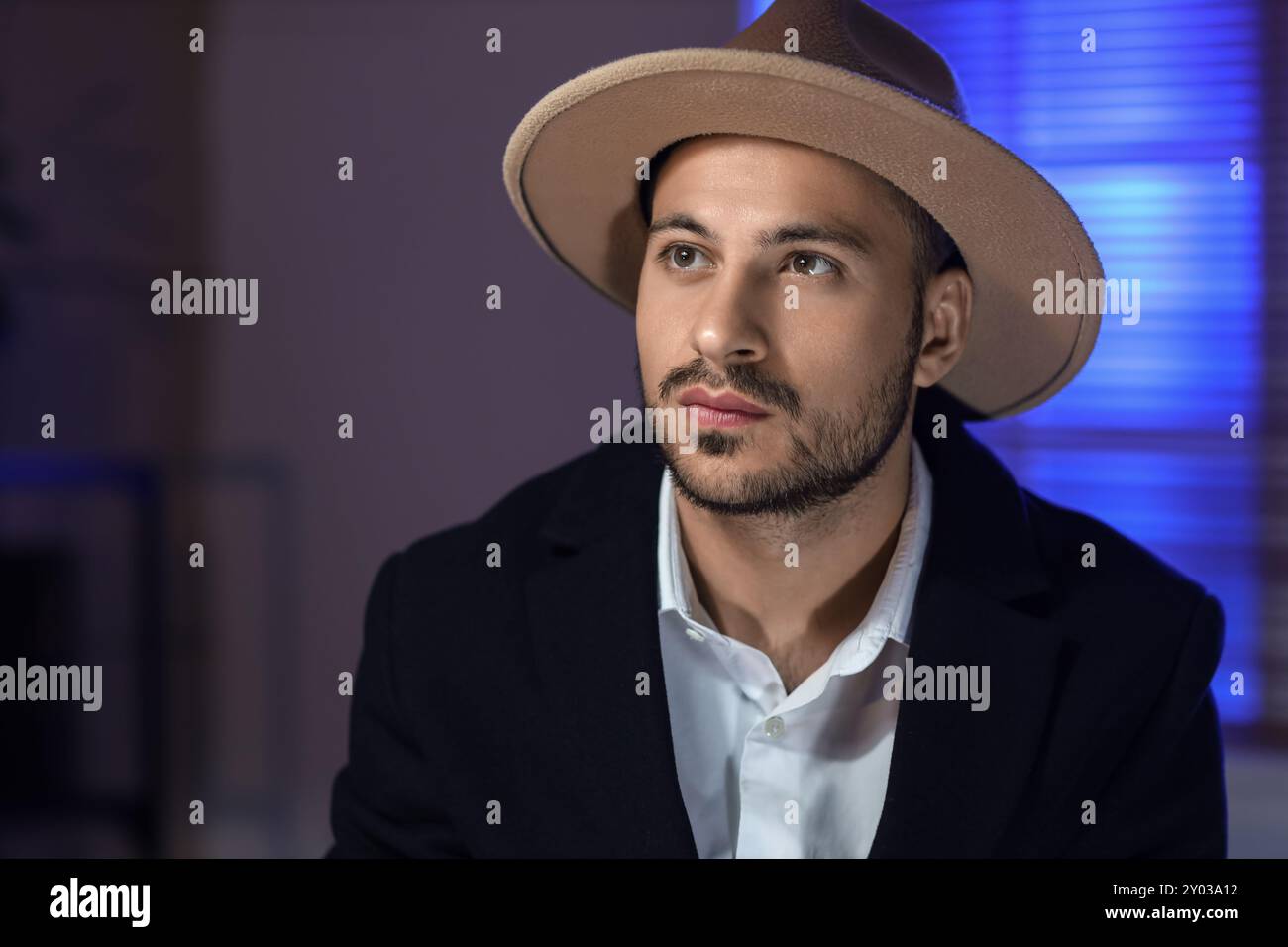 Male detective in office at night, closeup Stock Photo - Alamy