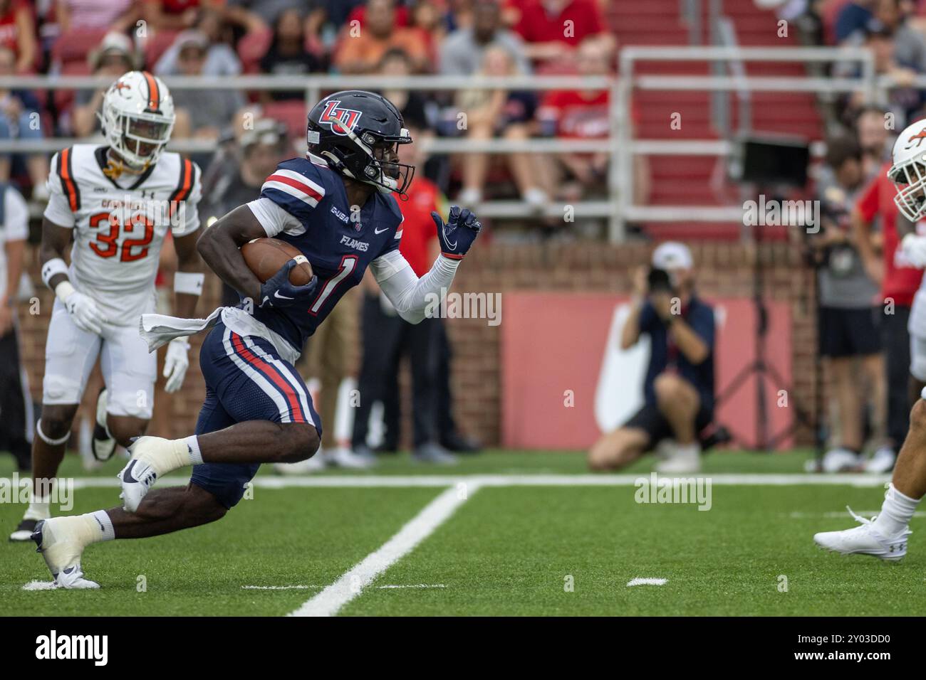 August 31, 2024: Liberty Flames wide receiver Julian Gray (1) returns a ...
