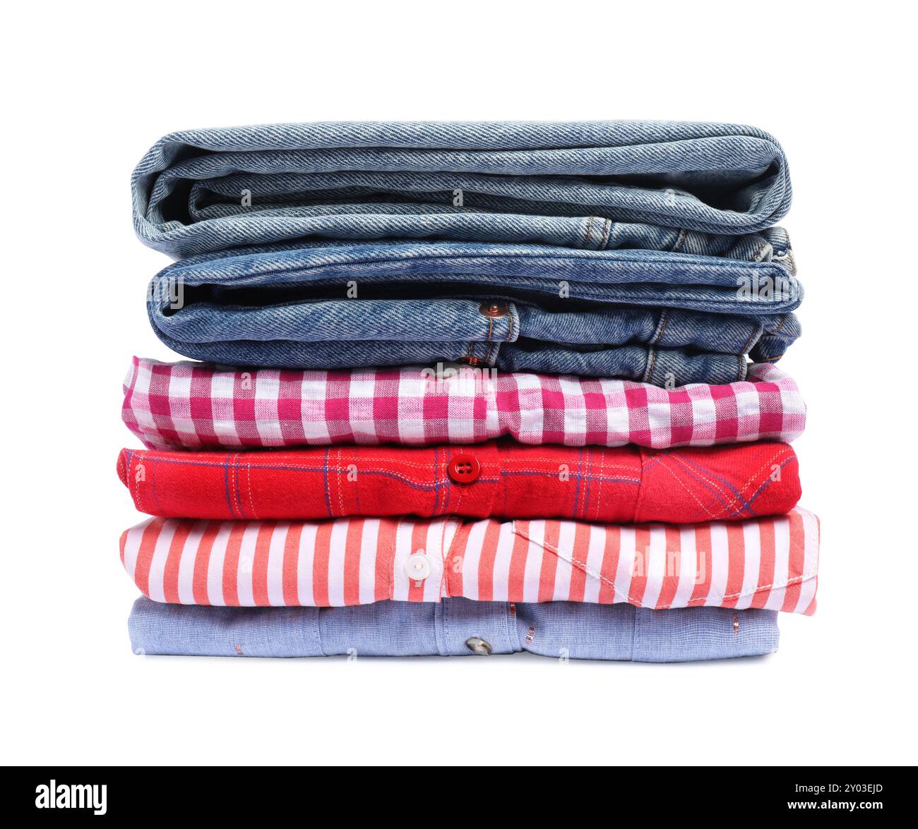 Stack of shirts and jeans isolated on white Stock Photo - Alamy