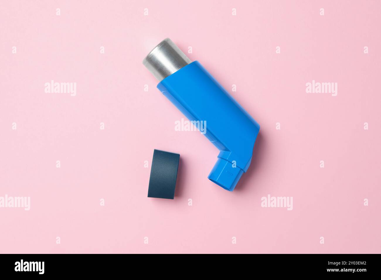 Asthma inhaler on pink background, top view Stock Photo - Alamy