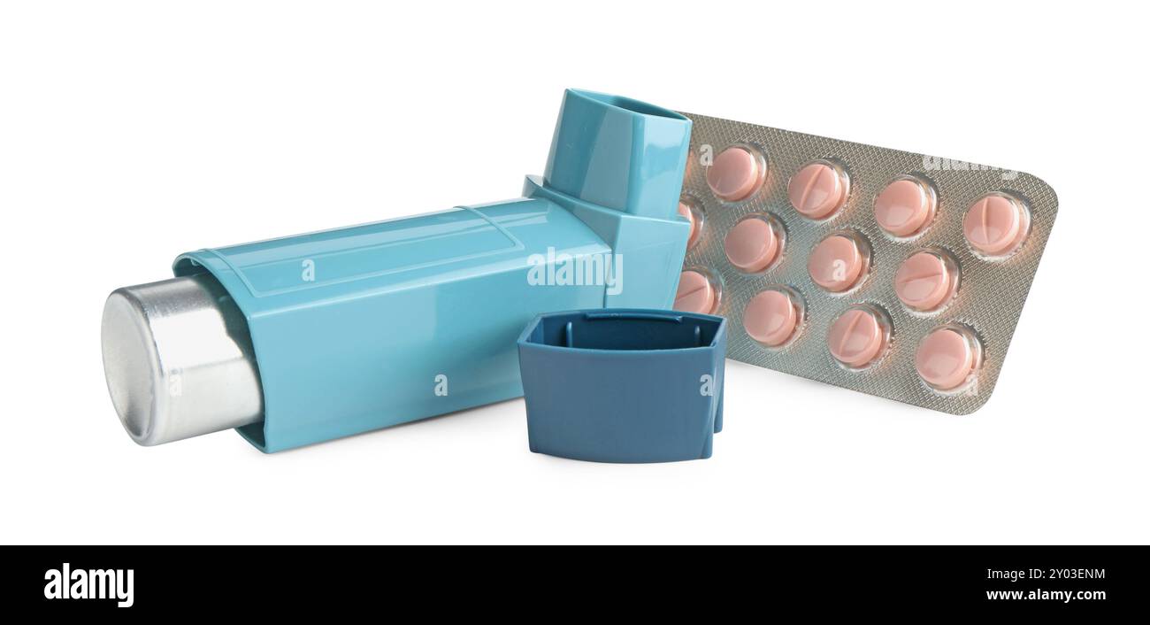 Asthma treatment. Inhaler and pills isolated on white Stock Photo - Alamy