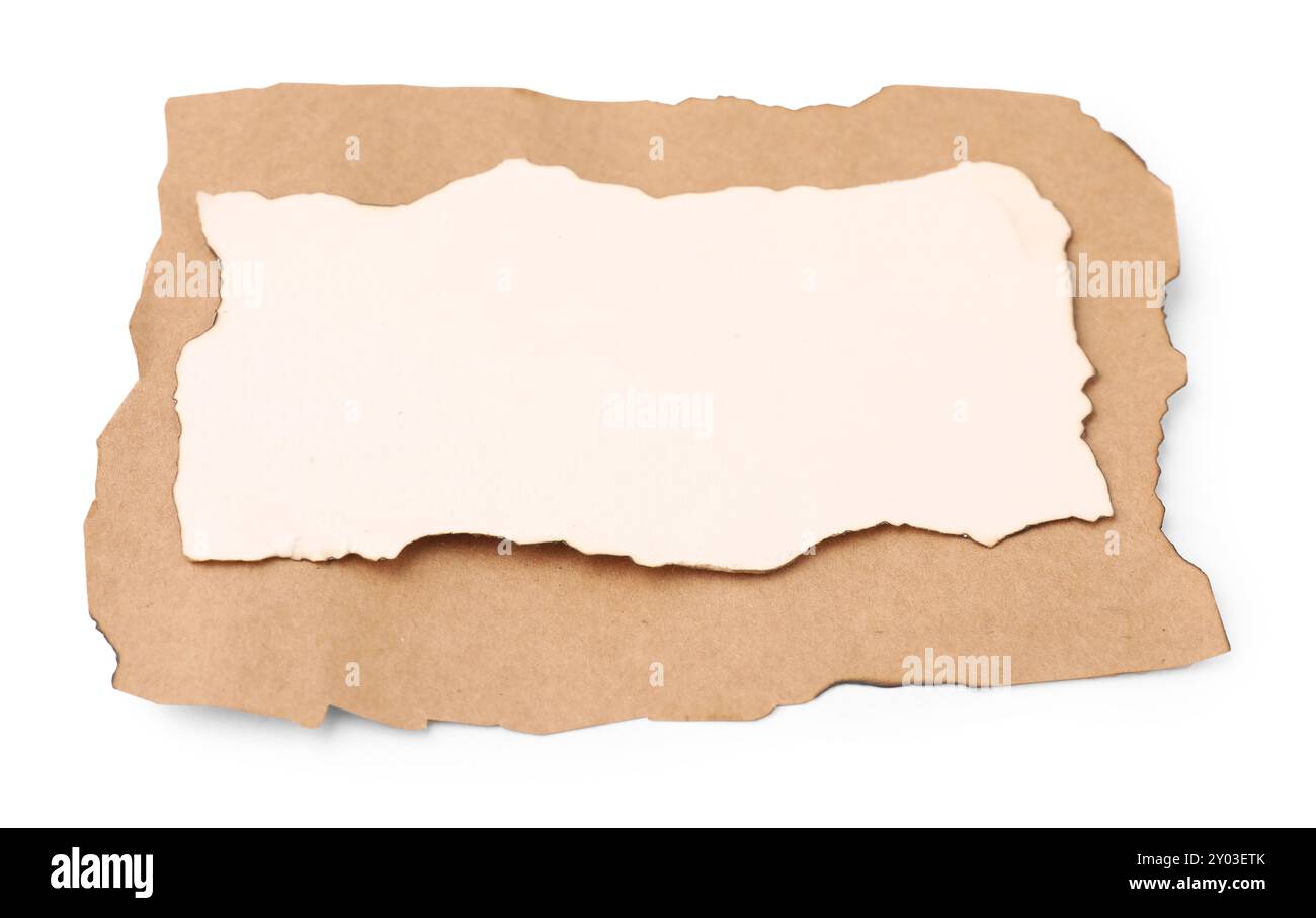 Pieces of old paper with dark burnt borders isolated on white Stock ...