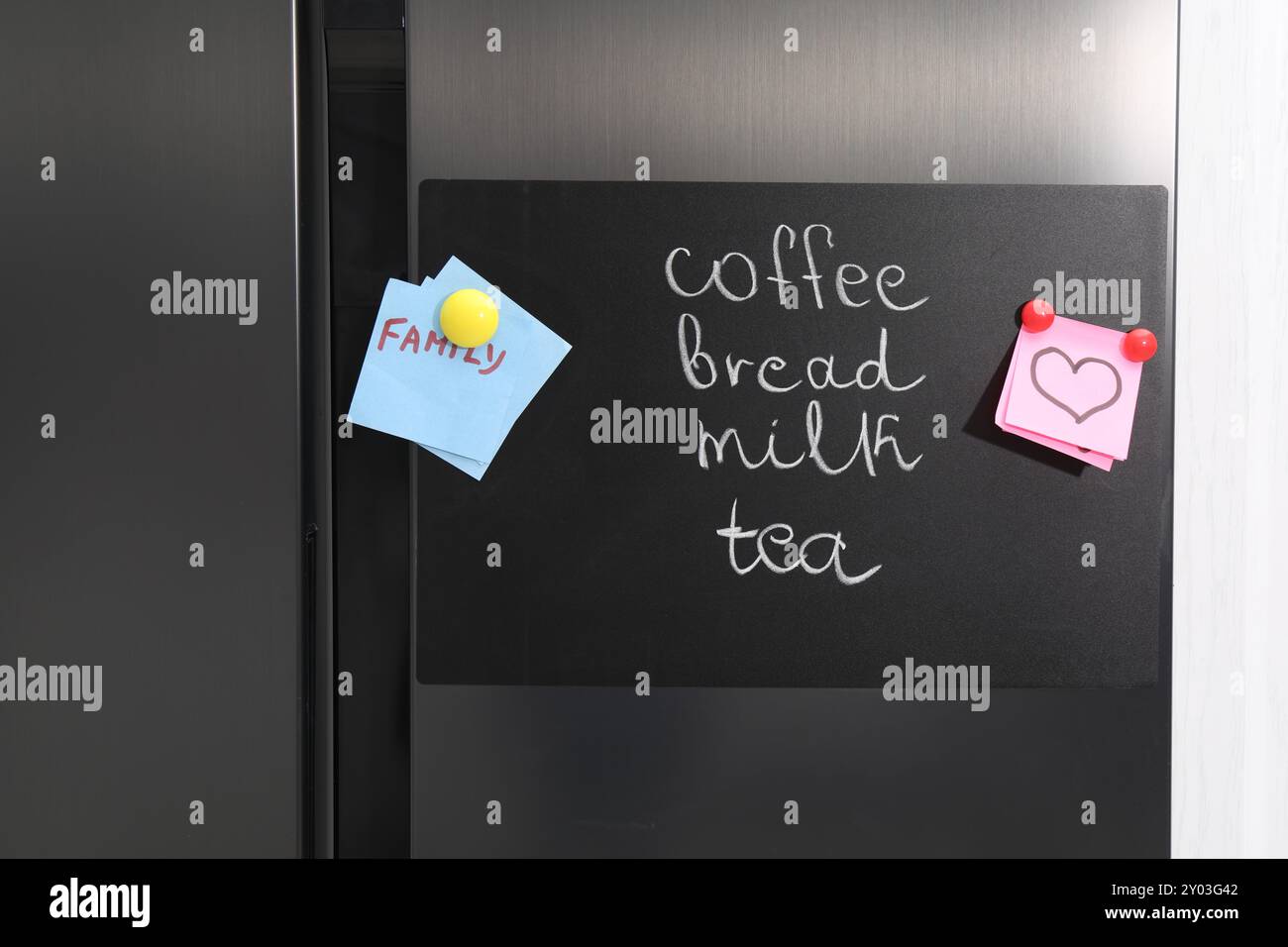Magnetic board with shopping list and notes on refrigerator Stock Photo ...