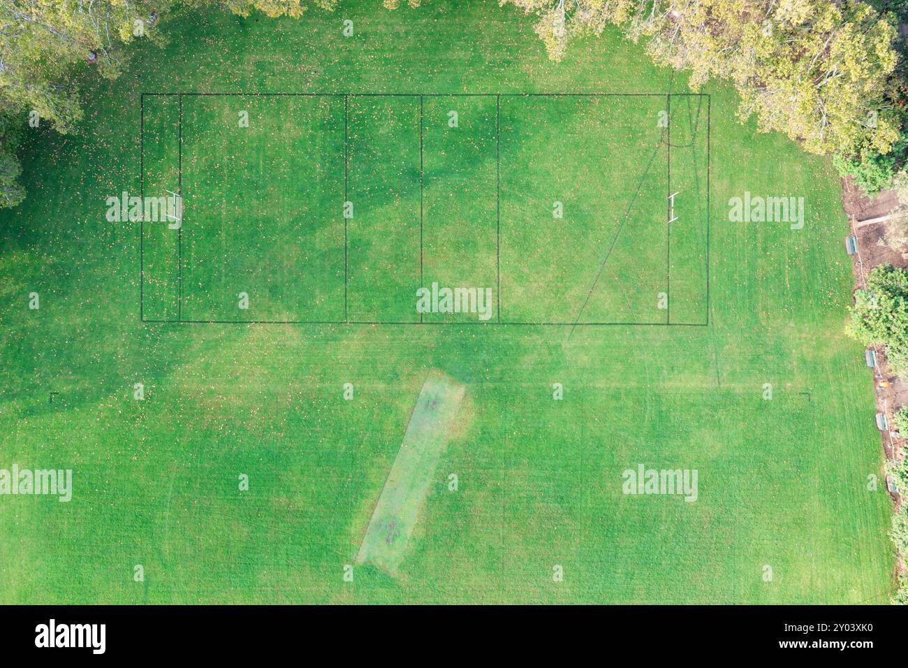 Top down aerial view of a rugby field and synthetic cricket pitch in ...