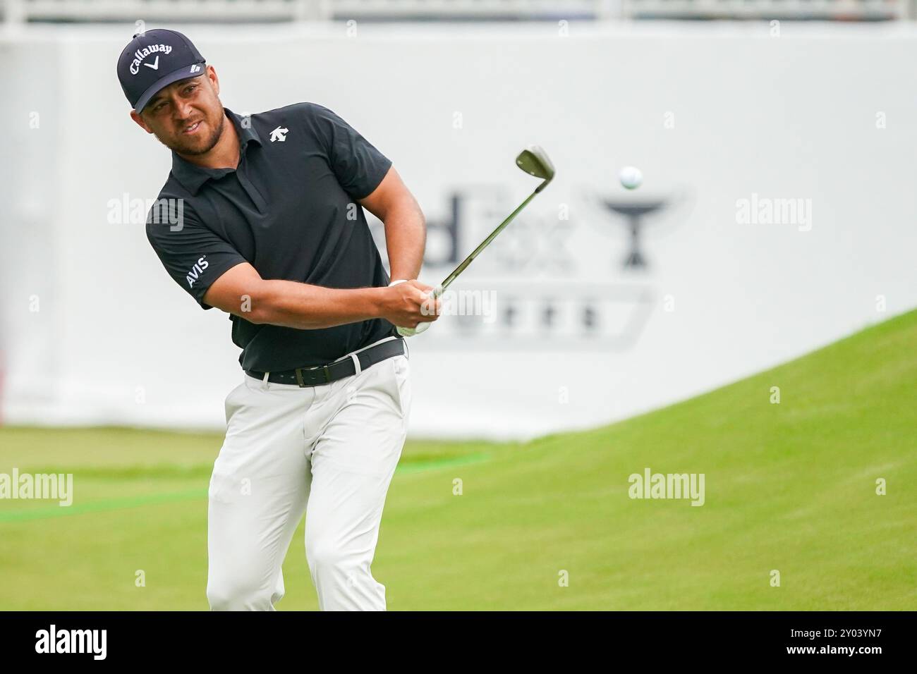 Atlanta, Georgia, USA. 31st Aug, 2024. Xander Schauffele chips on to ...
