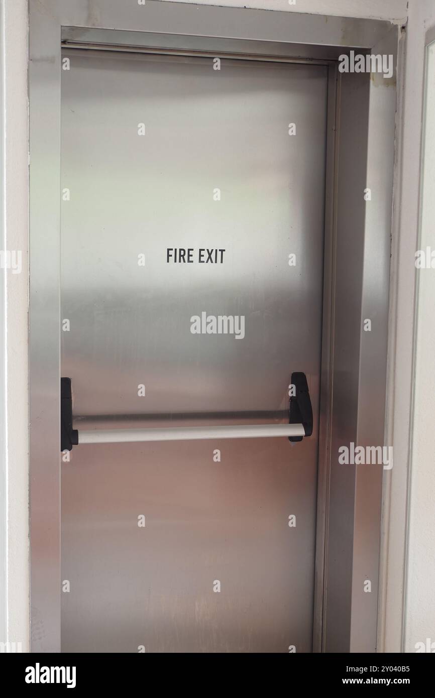 emergency exit door inside of a building Stock Photo - Alamy
