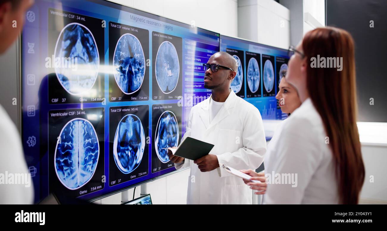 Doctors In Clinic Looking At Brain MRI Scan. Neurology Diagnosis Stock ...