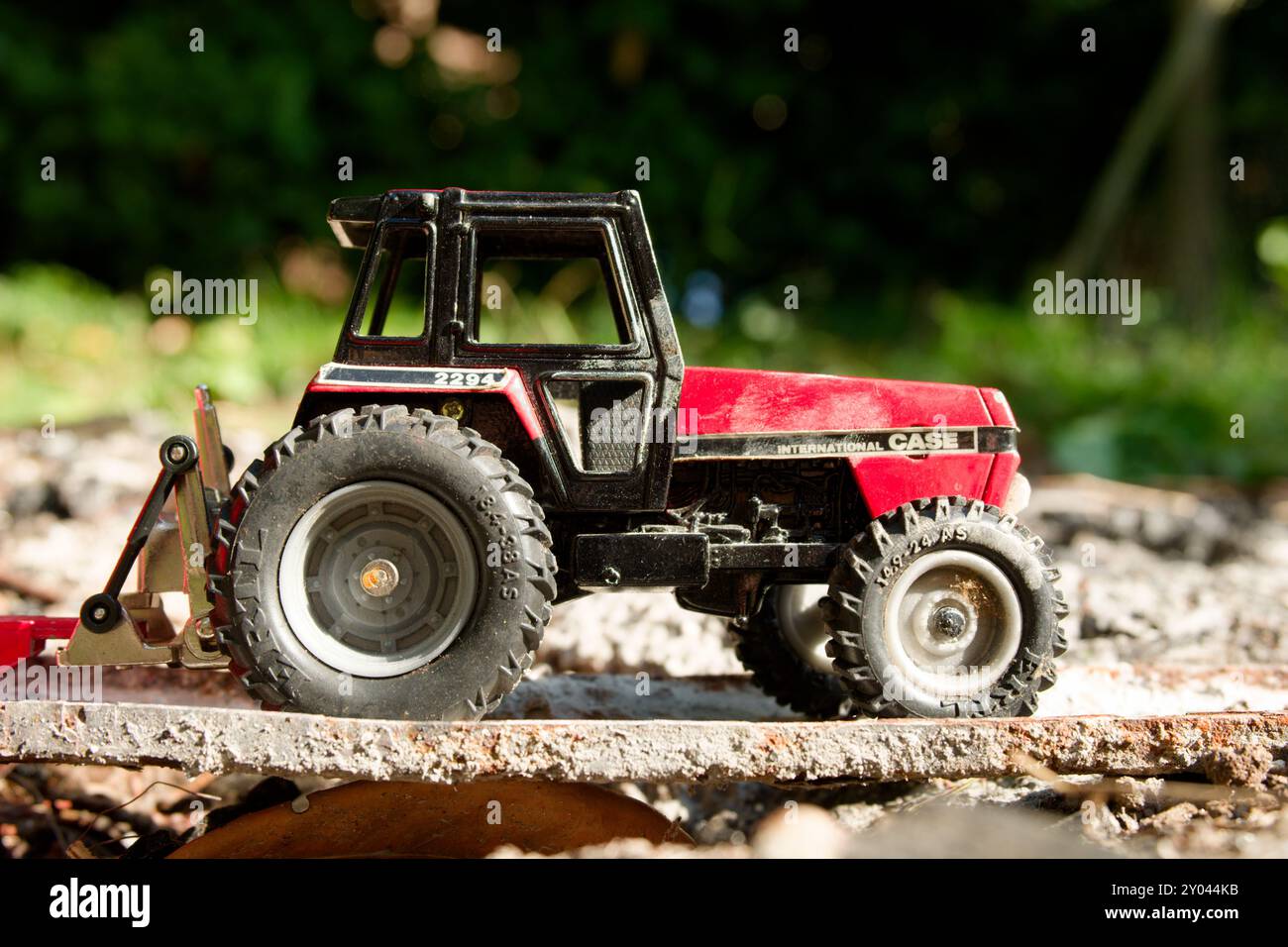 Red toy tractor close up Stock Photo - Alamy