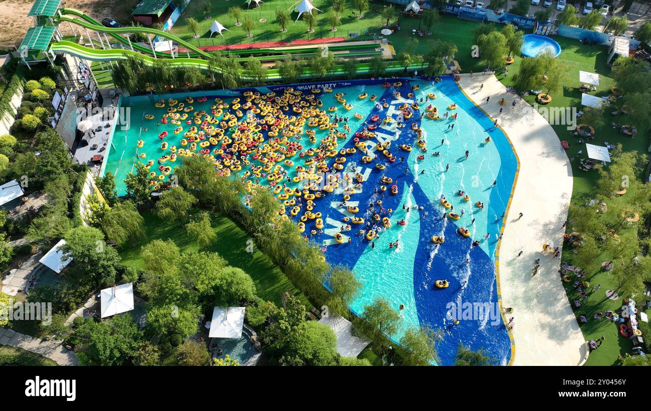 Aerial photos show people playing at a water park in Shenyang City ...