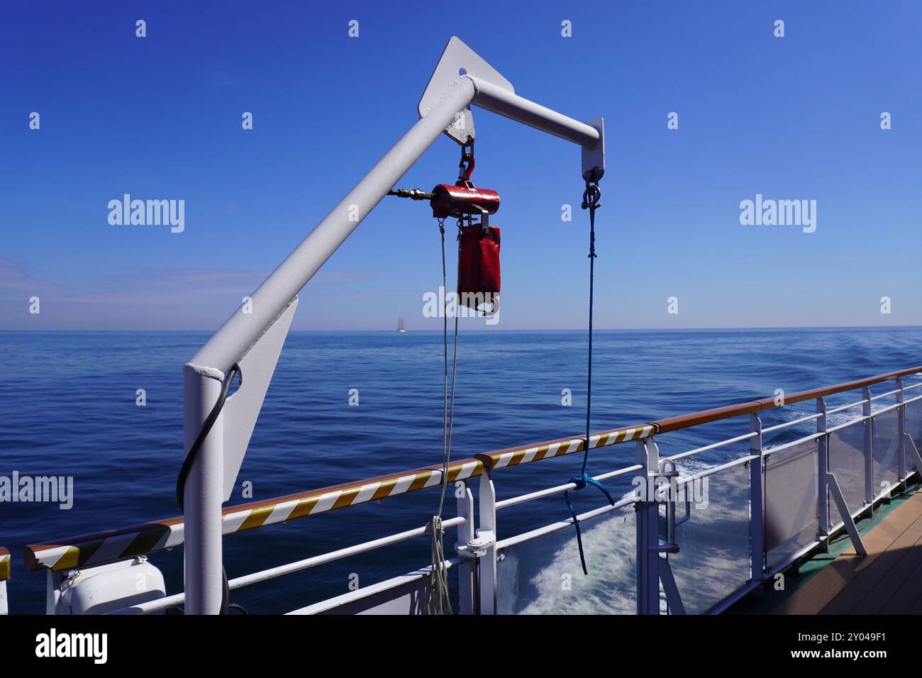 Mini Crane for hoisting up Gangway on a Helgoland Ferry Stock Photo - Alamy
