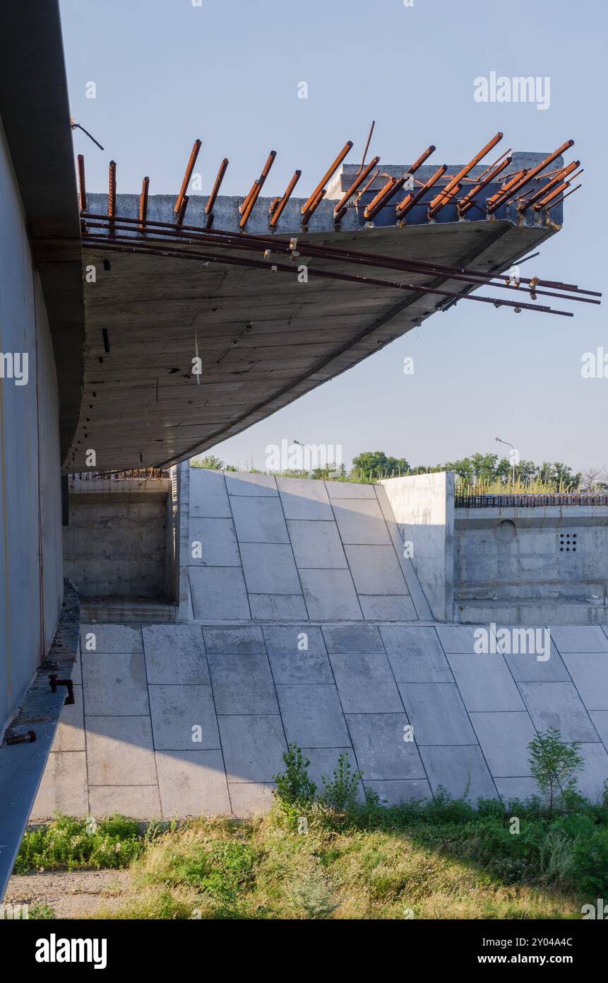 the construction of a bridge across the river with the supports ...