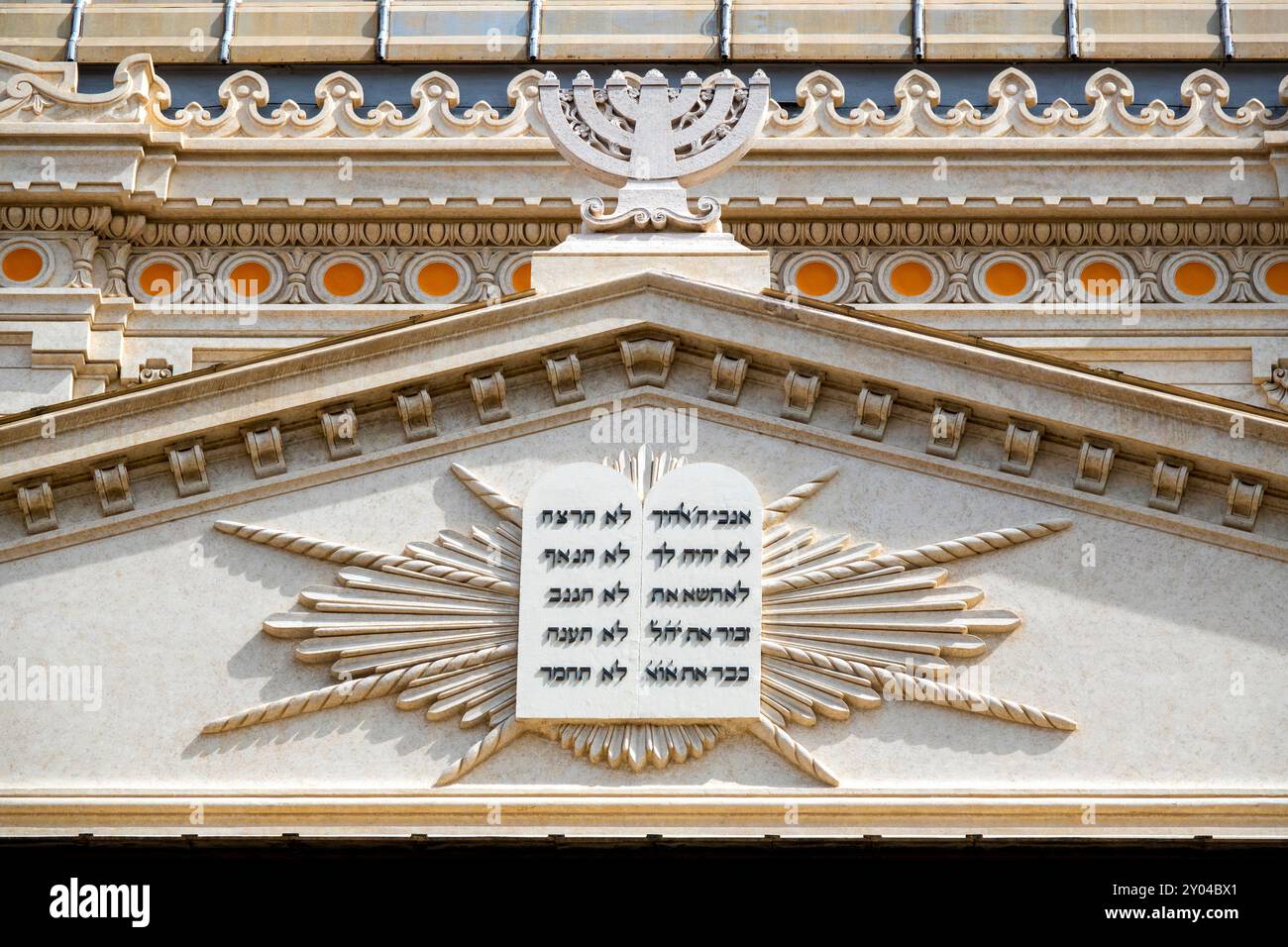 Details of the façade with ornaments representing the Temple menorah ...