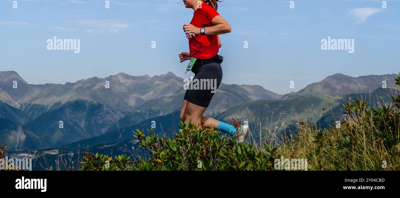 female runner run steep slope mountain marathon race Stock Photo - Alamy