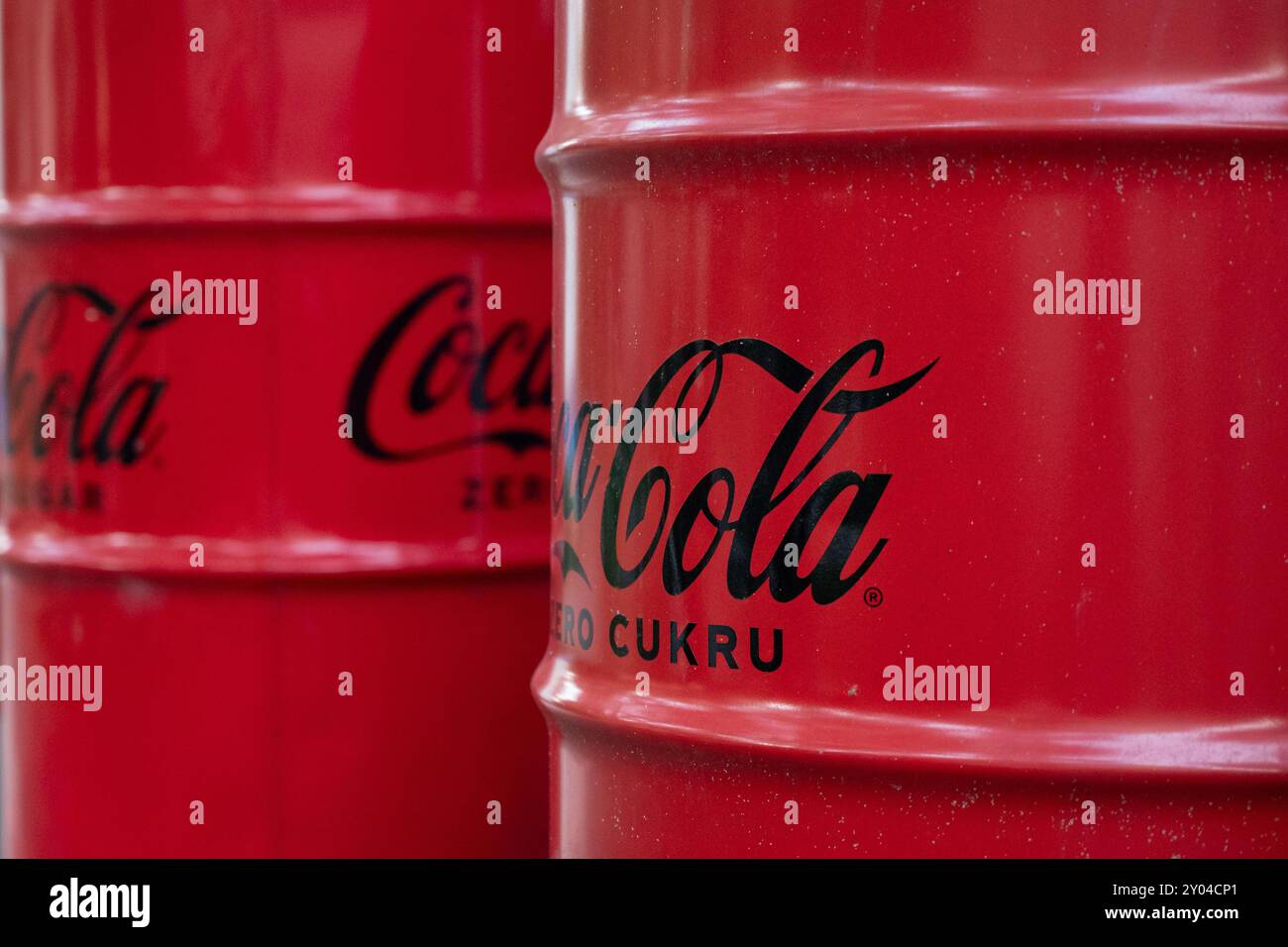 bug red cans with black coca cola logo - beverage brand background ...